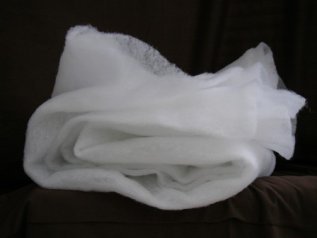 Using polyester wadding will help give a layer of warmth.